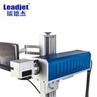 China Touch Screen Flying Co2 Laser Marking Machine 30W For Hard Plastic Tube for sale