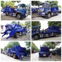 China SINOTRUK HOWO 4X2 5CBM Swing Arm Garbage Truck For Urban Garbage Clean Up for sale