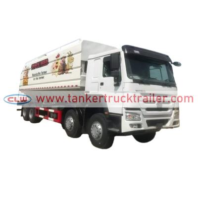 China Sinotruk HOWO 8X4 40CBM 20tons Hydraulic Driven Bulk Feed Truck for Feed Mill for sale