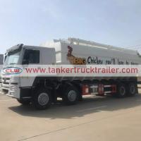 China Sinotruk HOWO 8X4 40CBM 20tons Hydraulic Driven Bulk Feed Truck for Feed Mill for sale