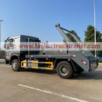 China Sinotruk HOWO 4×2 10CBM Skip Loader Roll Off Garbage Truck for Solid Waste Collection for sale