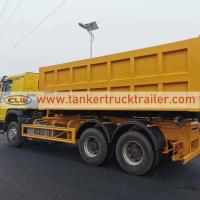 China HOWO 6X4 25m3 Heavy Duty Hook Loader Truck for Construction Waste for sale