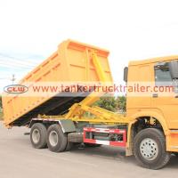 China HOWO 6X4 25m3 Heavy Duty Hook Loader Truck for Construction Waste for sale