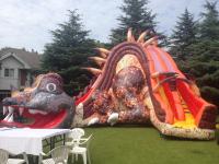 China Commercial Inflatable Dinosaur Slide 11.7x8.8x6.5m Custom PVC Bounce for Amusement Park for sale
