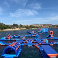 China Inflatable Floating Water Park 0.9mm PVC Custom Size for Summer Water Play for sale