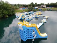 China Inflatable Floating Water Park 0.9mm PVC Custom Size for Summer Water Play for sale