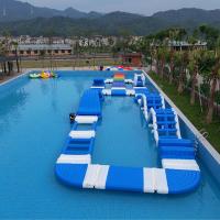 China Custom Inflatable Pool Obstacle Course With Floating Platforms Climbing Areas And Balance Modules for Swimming Pool Events for sale