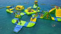 China Commercial Inflatable Floating Water Park PVC 500kg Capacity Custom Outdoor Play Equipment for sale