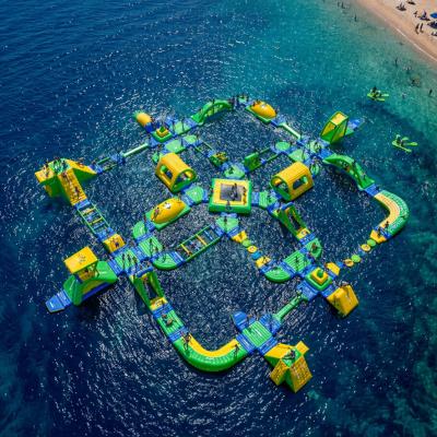 China Large Custom Inflatable Water Park With Floating Obstacle Course And Slide Playground Structure Modular Inflatable Aqua Park With Interactive Floating Obstacles for sale