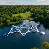 China Modular Inflatable Water Park 50m² Floating Aqua Park for Lake Resort Commercial Entertainment for sale