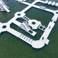 China Commercial Floating Aqua Park PVC Modular Water Recreation Equipment 50m Walkway Slides Platforms for Resort Lake Tourism for sale
