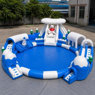China Custom Winter Theme Inflatable Land Water Park with 12ft Round Splash Pool Polar Bear Slide Igloo Tunnel for sale