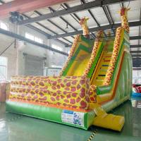 China Custom Giraffe Inflatable Slide 4m High Animal Theme Playground with Climbing Lane Safety Netting for Commercial Rental Events for sale
