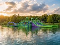 China Custom Large Floating Inflatable Water Park with Multi Lane Slides Towers Obstacles and Aqua Playground Modules for Resorts Lakes Camps and Rental Operations for sale