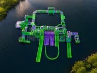 China Custom Large Floating Inflatable Water Park with Multi Lane Slides Towers Obstacles and Aqua Playground Modules for Resorts Lakes Camps and Rental Operations for sale