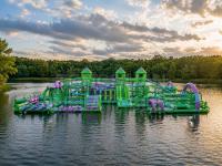 China Custom Large Floating Inflatable Water Park with Multi Lane Slides Towers Obstacles and Aqua Playground Modules for Resorts Lakes Camps and Rental Operations for sale