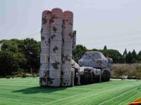 China Custom Inflatable Launcher Vehicle Decoy with Vertical Canister Structures and Camouflage Truck Body for Training Displays and Outdoor Simulation Projects for sale