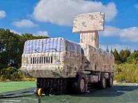 China Custom Inflatable Radar Vehicle Decoy with Raised Rectangular Antenna Panel Detailed Truck Body and Camouflage Printing for Training Display Projects for sale
