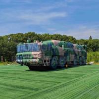 China Custom Inflatable Launcher Vehicle Replica with Long Canister Body Multi Axle Chassis and Camouflage Printing for Training Displays and Outdoor Projects for sale