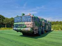 China Custom Inflatable Launcher Vehicle Replica with Long Canister Body Multi Axle Chassis and Camouflage Printing for Training Displays and Outdoor Projects for sale