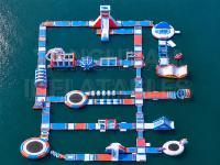 China Custom Modular Inflatable Water Park with Floating Walkways Slides Trampolines and Balance Obstacles for Lakes Resorts Beaches and Commercial Recreation Projects for sale