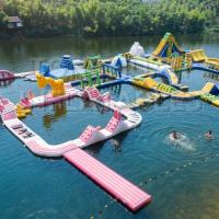 China Custom Modular Inflatable Water Park with Colorful Slides Climbing Walls Balance Bridges and Floating Activity Zones for Lakes Resorts Camps and Commercial Projects for sale
