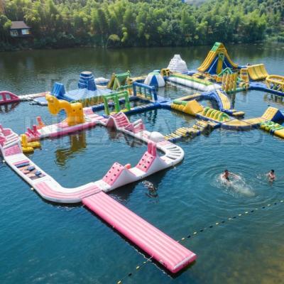 China Custom Modular Inflatable Water Park with Colorful Slides Climbing Walls Balance Bridges and Floating Activity Zones for Lakes Resorts Camps and Commercial Projects for sale