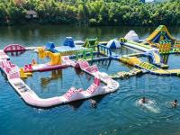 China Custom Modular Inflatable Water Park with Colorful Slides Climbing Walls Balance Bridges and Floating Activity Zones for Lakes Resorts Camps and Commercial Projects for sale