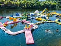 China Custom Modular Inflatable Water Park with Colorful Slides Climbing Walls Balance Bridges and Floating Activity Zones for Lakes Resorts Camps and Commercial Projects for sale