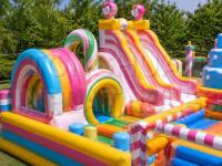 China Large Inflatable Candyland Fun Park with Double Slides Interactive Games and Colorful Decorations for Rental Projects for sale