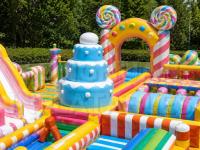 China Large Inflatable Candyland Fun Park with Double Slides Interactive Games and Colorful Decorations for Rental Projects for sale