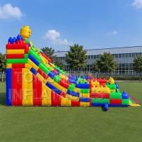 China Building Block Theme Inflatable Dual Lane Slide for Parks Schools Events and Commercial Rental Business for sale