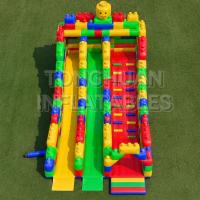 China Building Block Theme Inflatable Dual Lane Slide for Parks Schools Events and Commercial Rental Business for sale