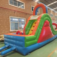 China Colorful Compact Inflatable Obstacle Course with Entrance Arches Climbing Slide and Safety Mesh for Schools Events and Rental Business for sale