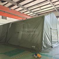 China Commercial Olive Green Inflatable PVC Tent with Reinforced Air Frame Roll Up Door and Ventilation Windows for Emergency Camps Field Operations for sale