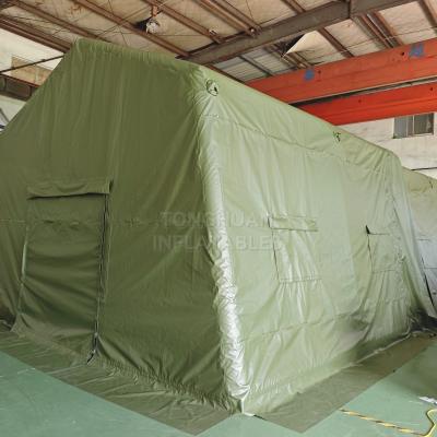 China Commercial Olive Green Inflatable PVC Tent with Reinforced Air Frame Roll Up Door and Ventilation Windows for Emergency Camps Field Operations for sale