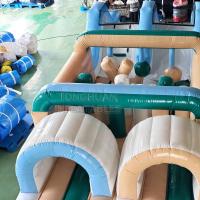 China Macaron Color Inflatable Obstacle Course with Tunnels Climbing Walls Slide and Safety Mesh for Events Schools and Rental Business for sale