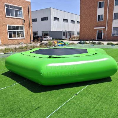 China Commercial Inflatable Floating Water Trampoline with Reinforced Jumping Mat and Anchor Points for Lakes Resorts and Water Parks for sale