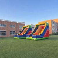China Commercial Colorful Double Lane Inflatable Slide Set with High Side Walls Climbing Steps and Safety Landing Area for Events and Rentals for sale