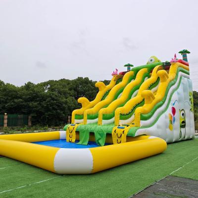 China Commercial Monster Theme Double Lane Inflatable Water Slide with Splash Pool Climbing Lanes and Safety Side Walls for Water Parks for sale