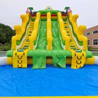 China Commercial Monster Theme Double Lane Inflatable Water Slide with Splash Pool Climbing Lanes and Safety Side Walls for Water Parks for sale