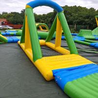 China Commercial Modular Inflatable Water Park with Trampoline Slides Bridges Climbing Obstacles and Custom Lake Layout for sale