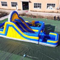 China Commercial Compact Inflatable Obstacle Course with Dual Climbing Lanes Slide Tunnels and Safety Walls for Parks and Rentals for sale