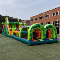China Commercial Neon Jungle Custom Inflatable Obstacle Course with Tunnels Climbing Wall Slide and Safety Mesh for sale