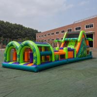 China Commercial Neon Jungle Custom Inflatable Obstacle Course with Tunnels Climbing Wall Slide and Safety Mesh for sale