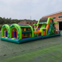 China Commercial Neon Jungle Custom Inflatable Obstacle Course with Tunnels Climbing Wall Slide and Safety Mesh for sale