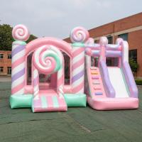 China Pastel Candy Inflatable Bouncer Slide with Lollipop Decorations Dual Play Areas and Safety Mesh for sale