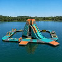 China Commercial Summit Adventure Floating Inflatable Water Park with Dual Racing Slides Climbing Tower Balance Obstacles and Modular Walkways for sale