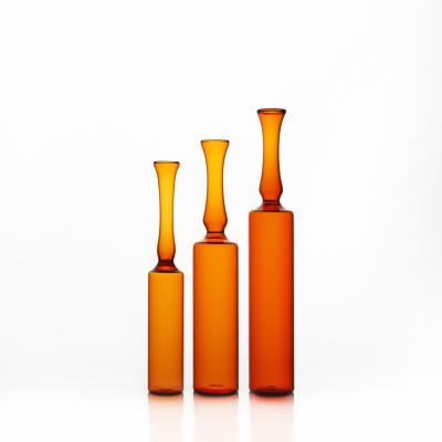 China Amber Borosilicate Glass Ampule 1ml 2ml with Break Ring for Laboratory Storage for sale