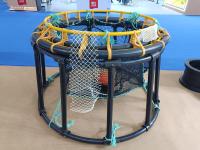 China Wave-proof modular PE cage for milkfish, stocking density 20–26kg/m³, multi-stage mesh for Philippines lagoon bangus culture. for sale